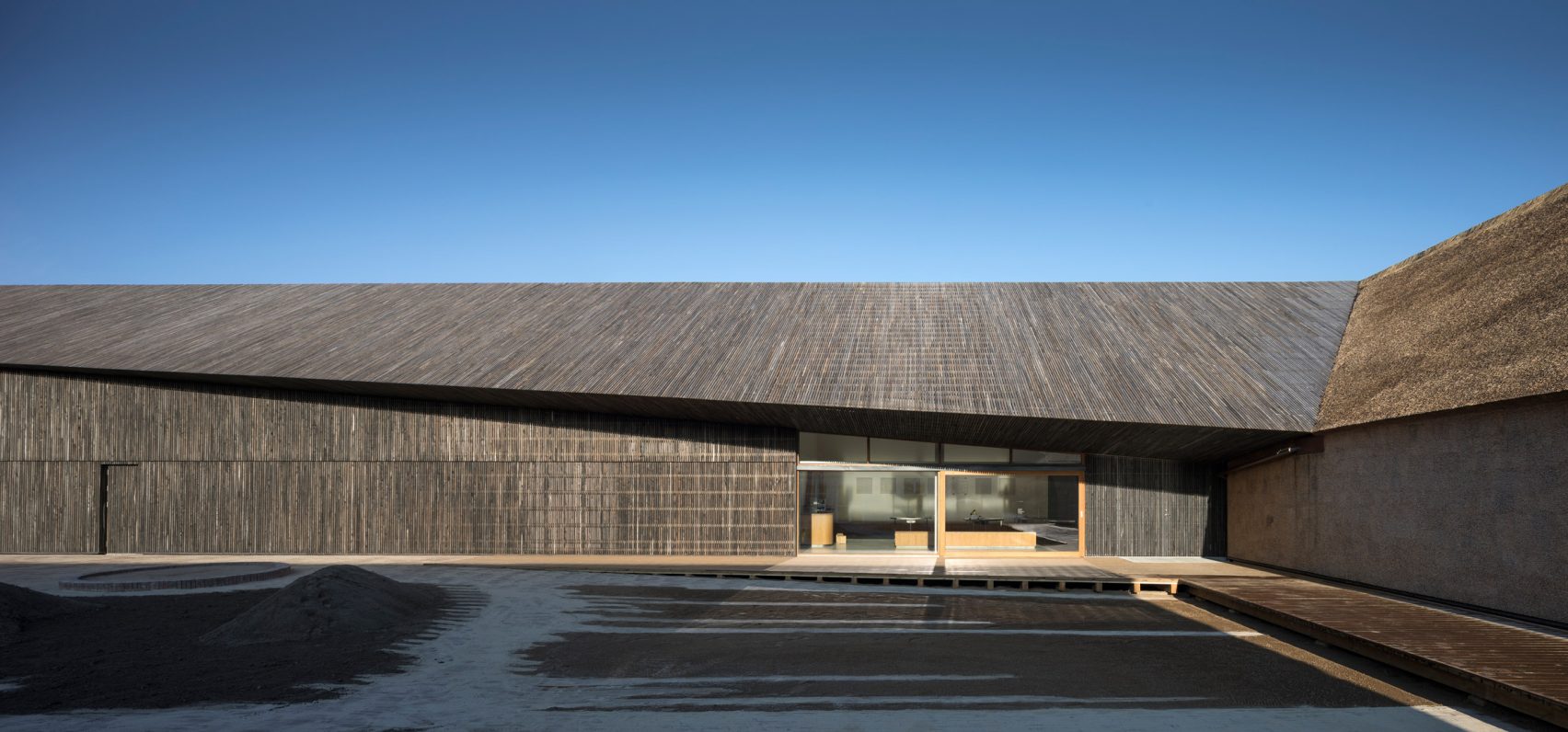 Dorte Mandrup Adds Thatched Wing To Wadden Sea Visitor Centre In Denmark