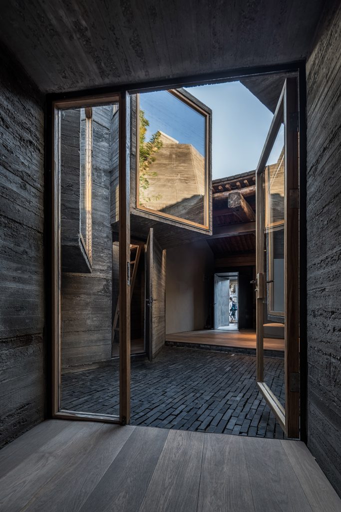 Micro Hostel with Tiny Concrete Rooms Installed by Zhang Ke in Old ...