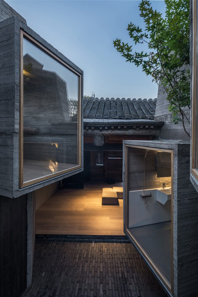 Micro Hostel with Tiny Concrete Rooms Installed by Zhang Ke in Old ...