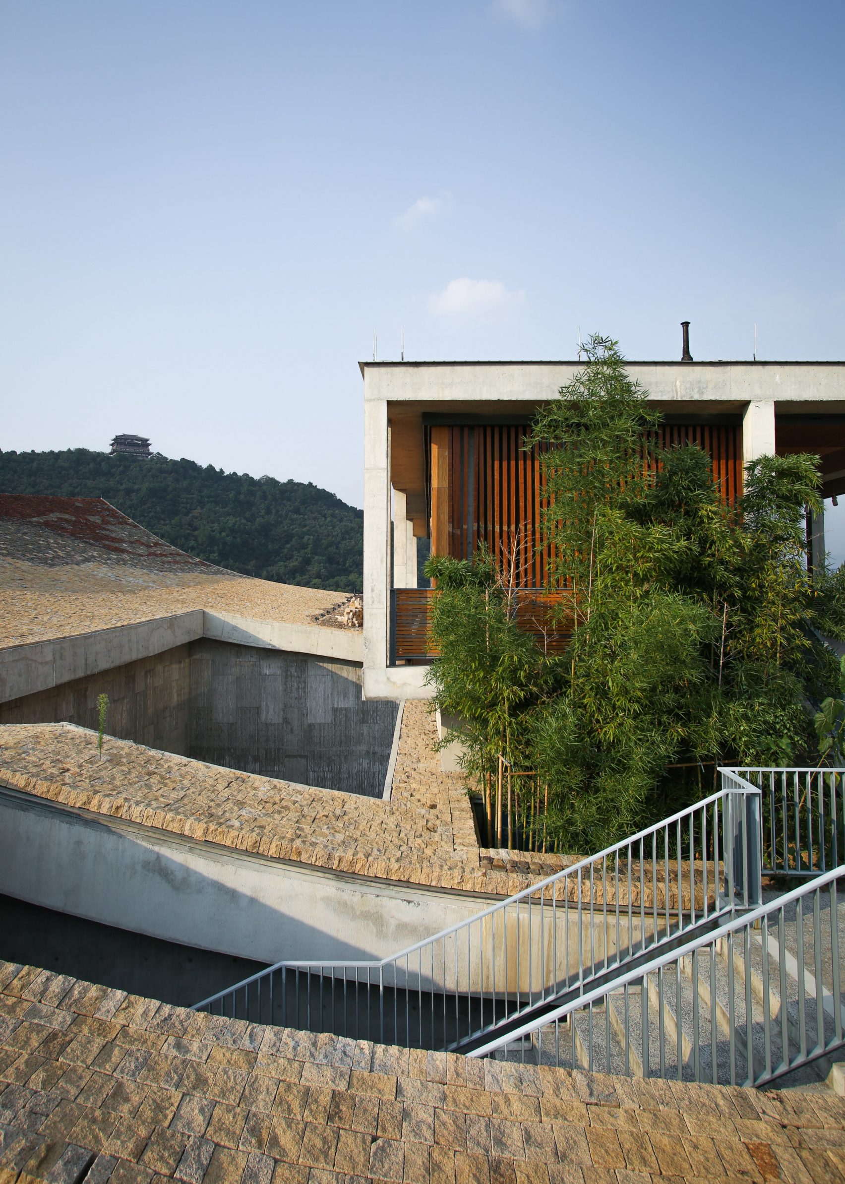 Wave-shaped roof of recycled tiles tops Wang Shu's Fuyang Cultural ...