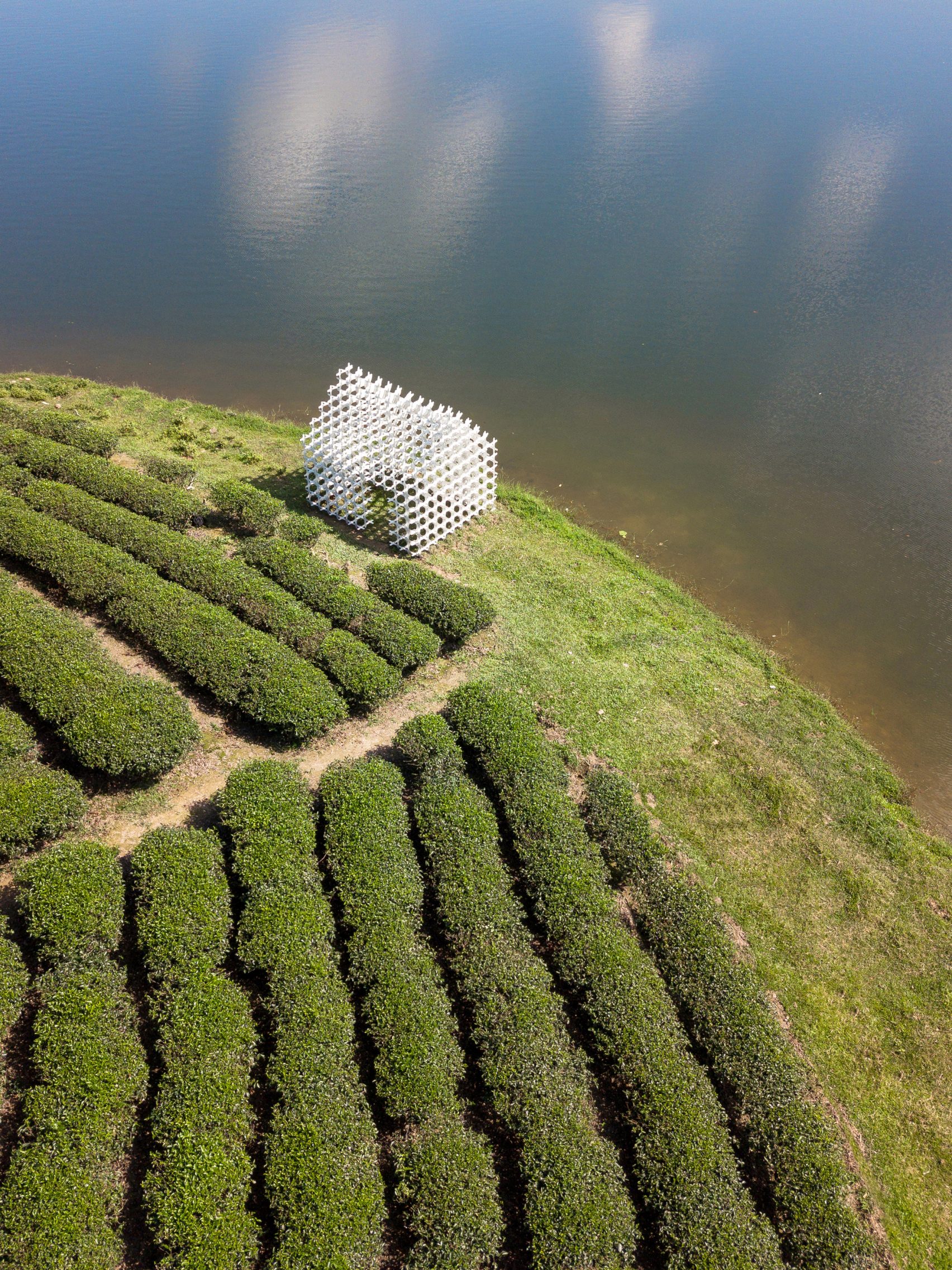 Modular pavilion at Vietnamese tea farm made from 2,000 wooden crosses ...