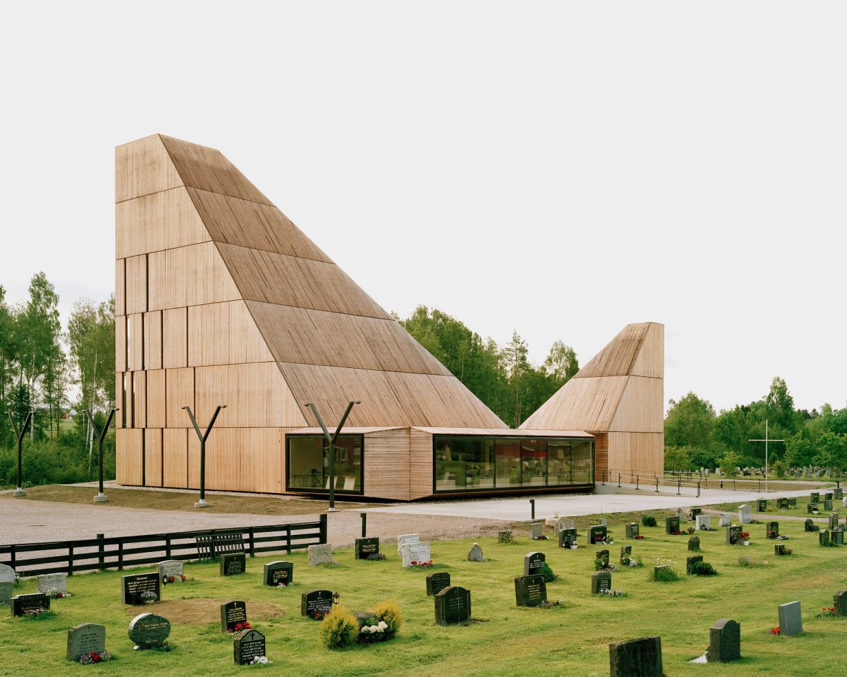 Timber church with angular roofs designed to evoke its historic ...
