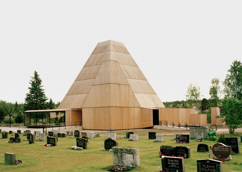 Timber church with angular roofs designed to evoke its historic ...