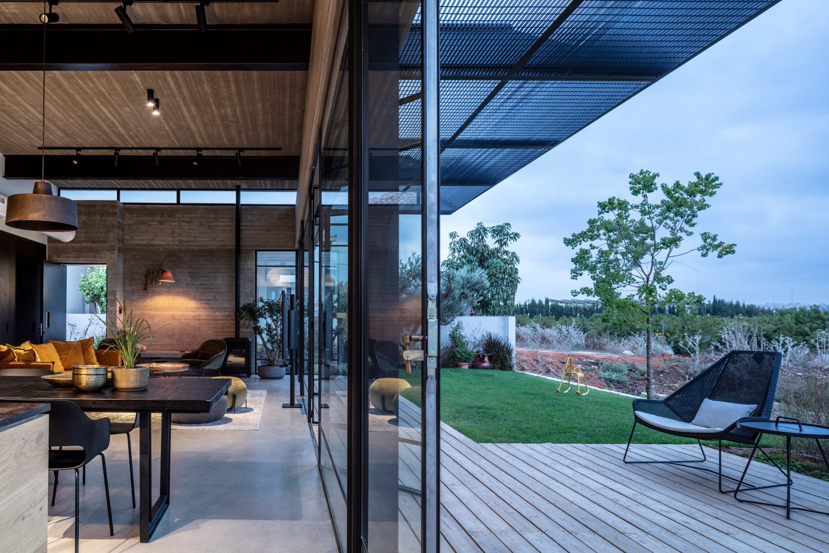 Jacobs Yaniv Architects' concrete Bare House opens out to a ...