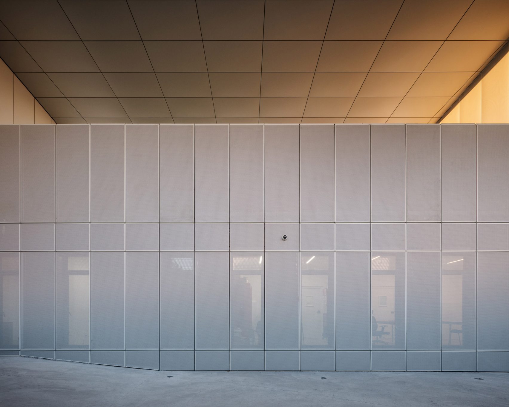 Minimum Security Prison Made Of Steel Has Pastel Coloured Sports Court