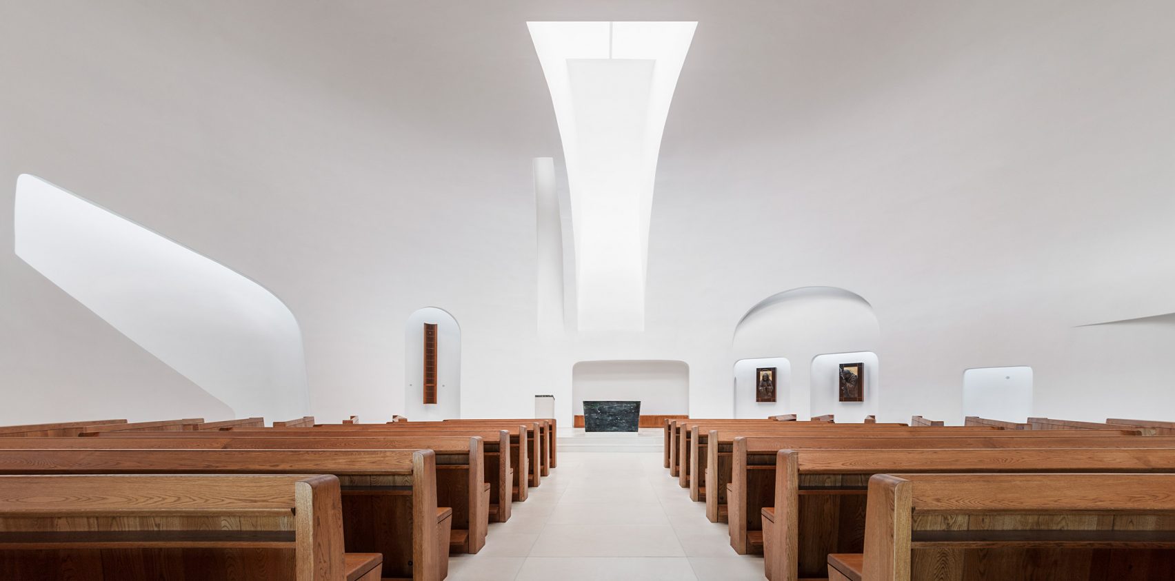 Robert Gutowski Architects designs minimal church interior in response ...