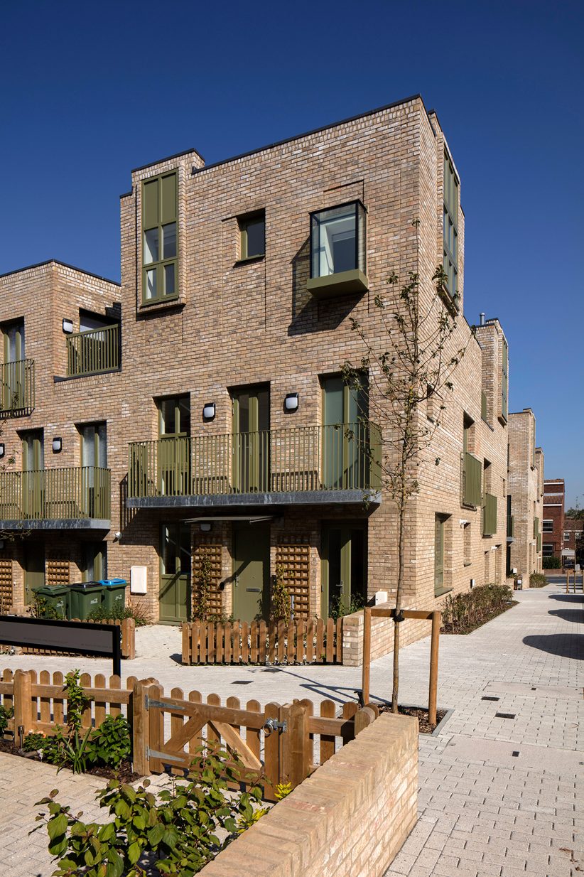 Peter Barber Architects adds terraced houses to estate in south London ...
