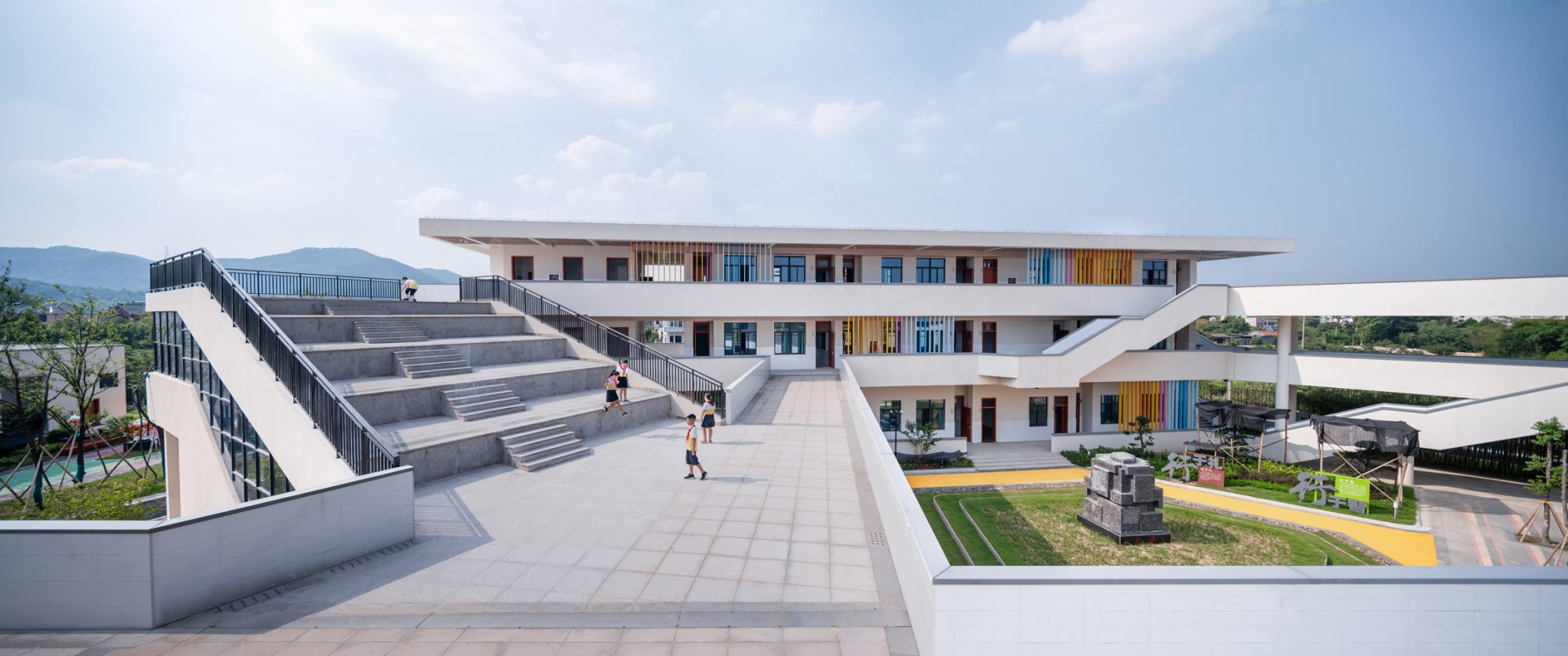 decmyk: Paths and playgrounds connect classrooms at Erdu Primary School