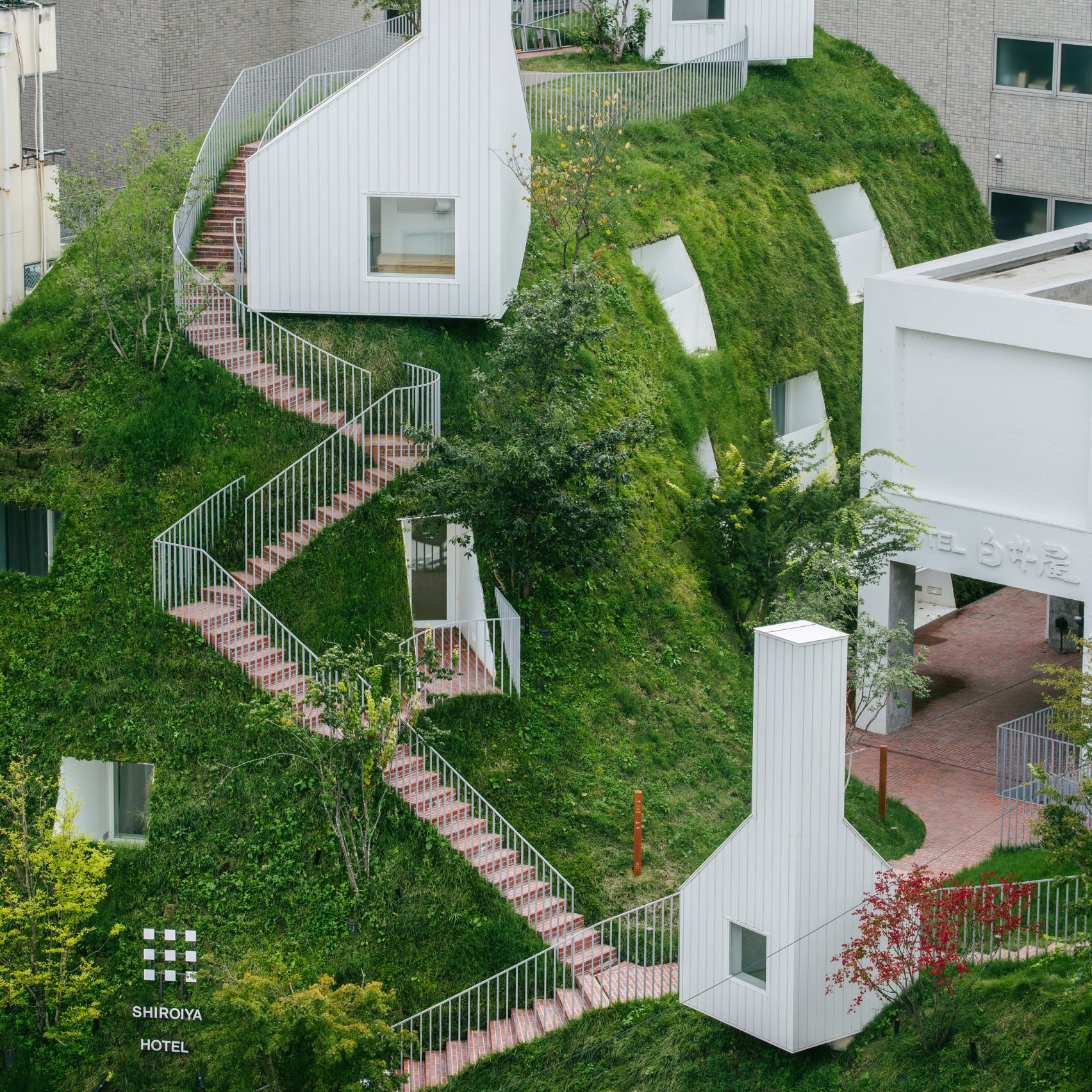 decmyk: Sou Fujimoto adds giant atrium and green hill to Shiroiya Hotel