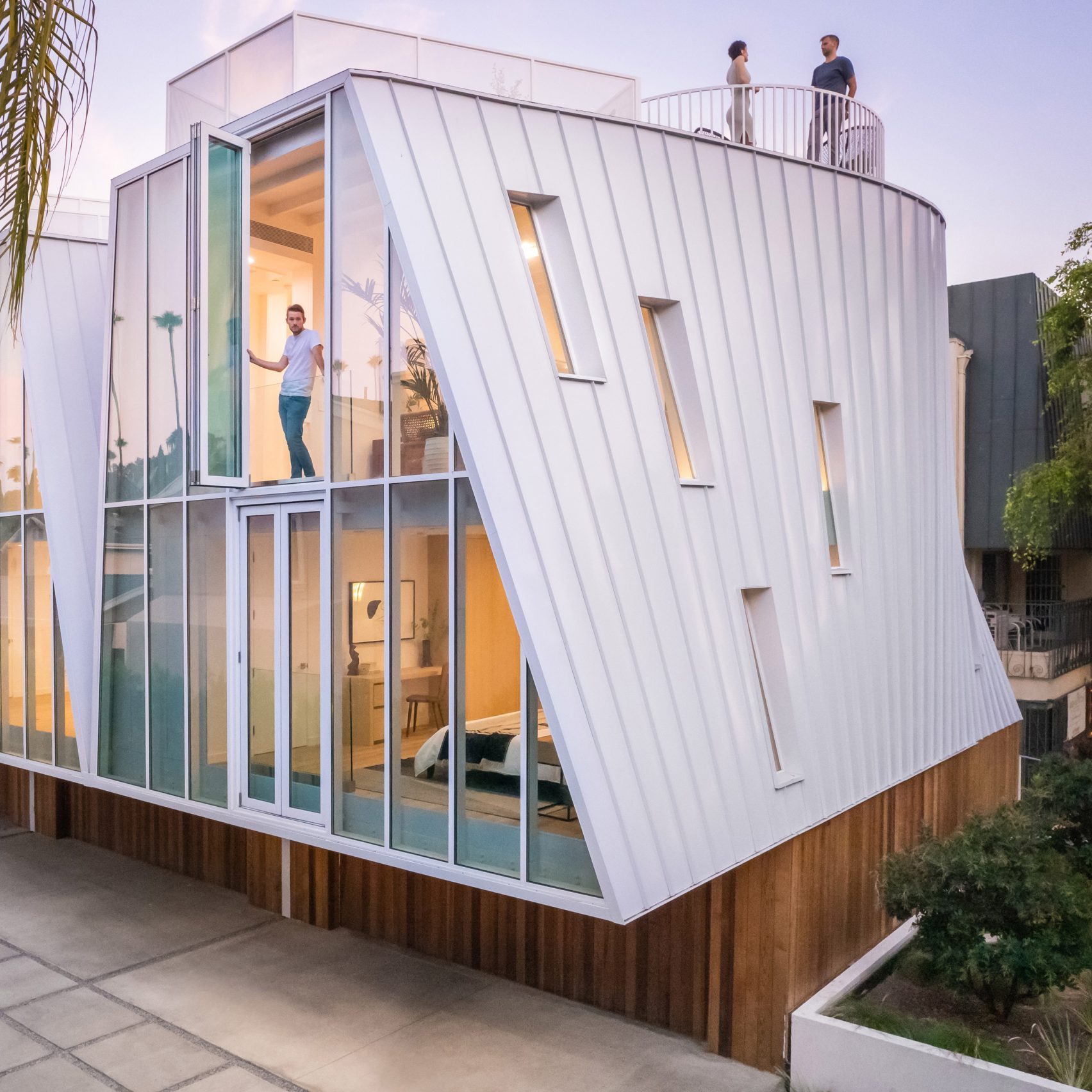 Sloped walls form Canyon Drive housing complex by LOHA in Los Angeles ...