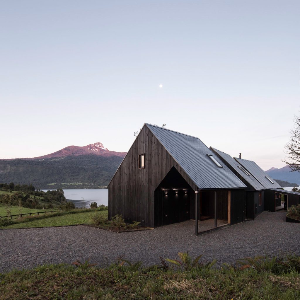 Pezo von Ellrichshausen reveals top-heavy house by a lagoon