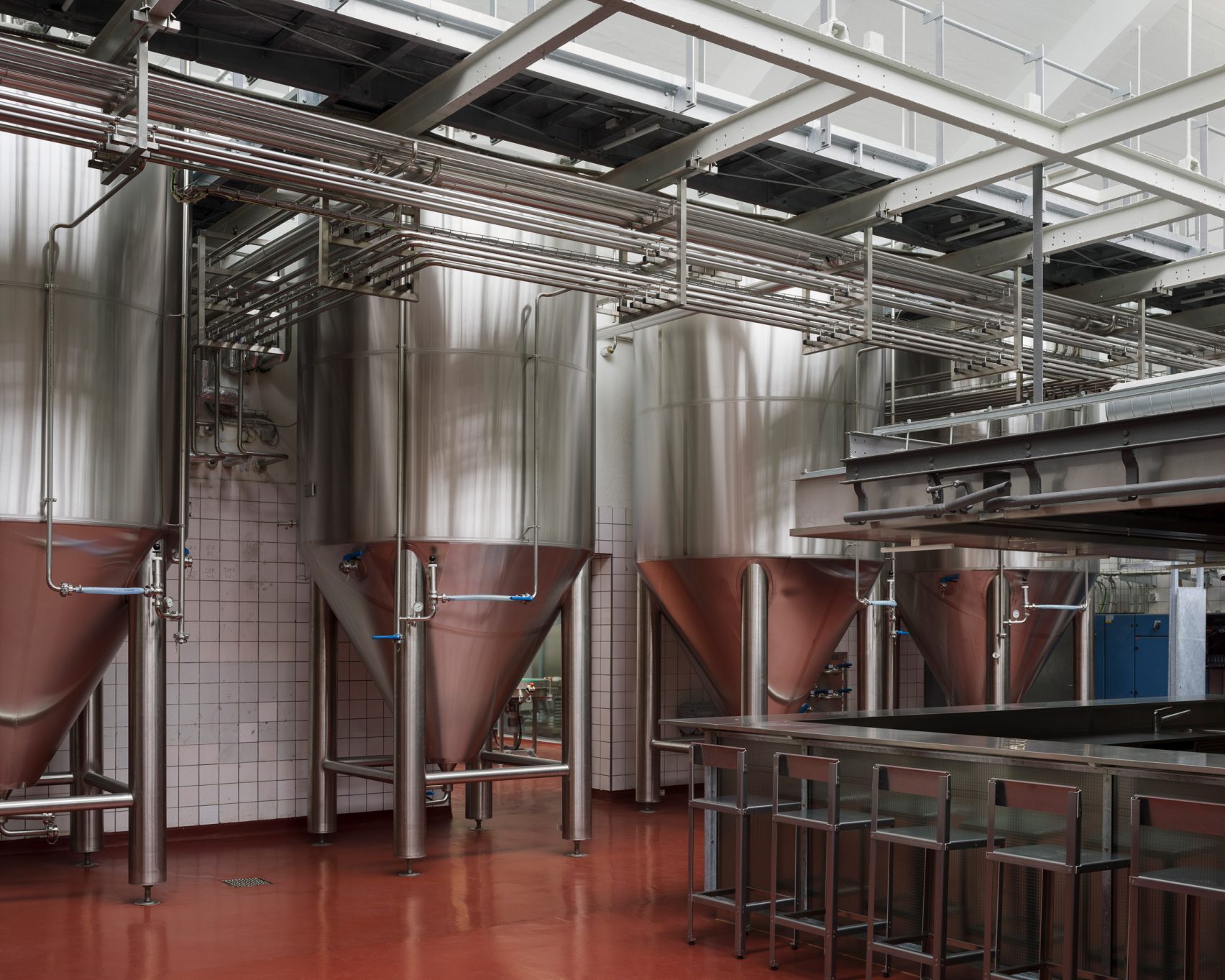 Pihlmann Architects creates ÅBEN brewery in former slaughterhouse ...