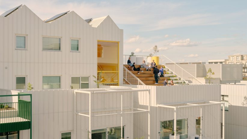 Bright yellow balconies enliven Melbourne apartment block by Austin ...