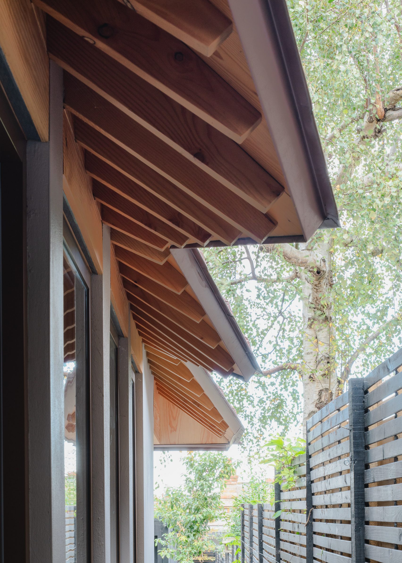 Proctor & Shaw tops London home extension with serrated zinc roof ...