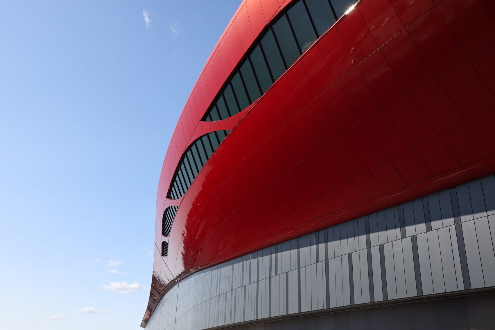 AECOM and Luis Vidal place sleek red roof on Boston airport terminal ...