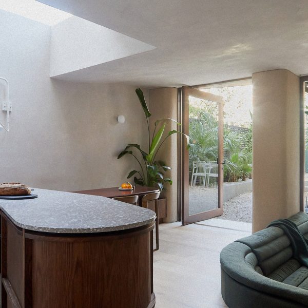 Sonn uses rough plaster finishes for "sculptural" London extension