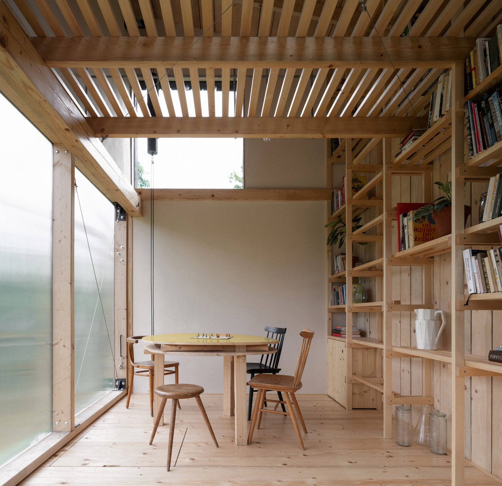 Byró Architekti creates wooden garden pavilion with folding facade ...