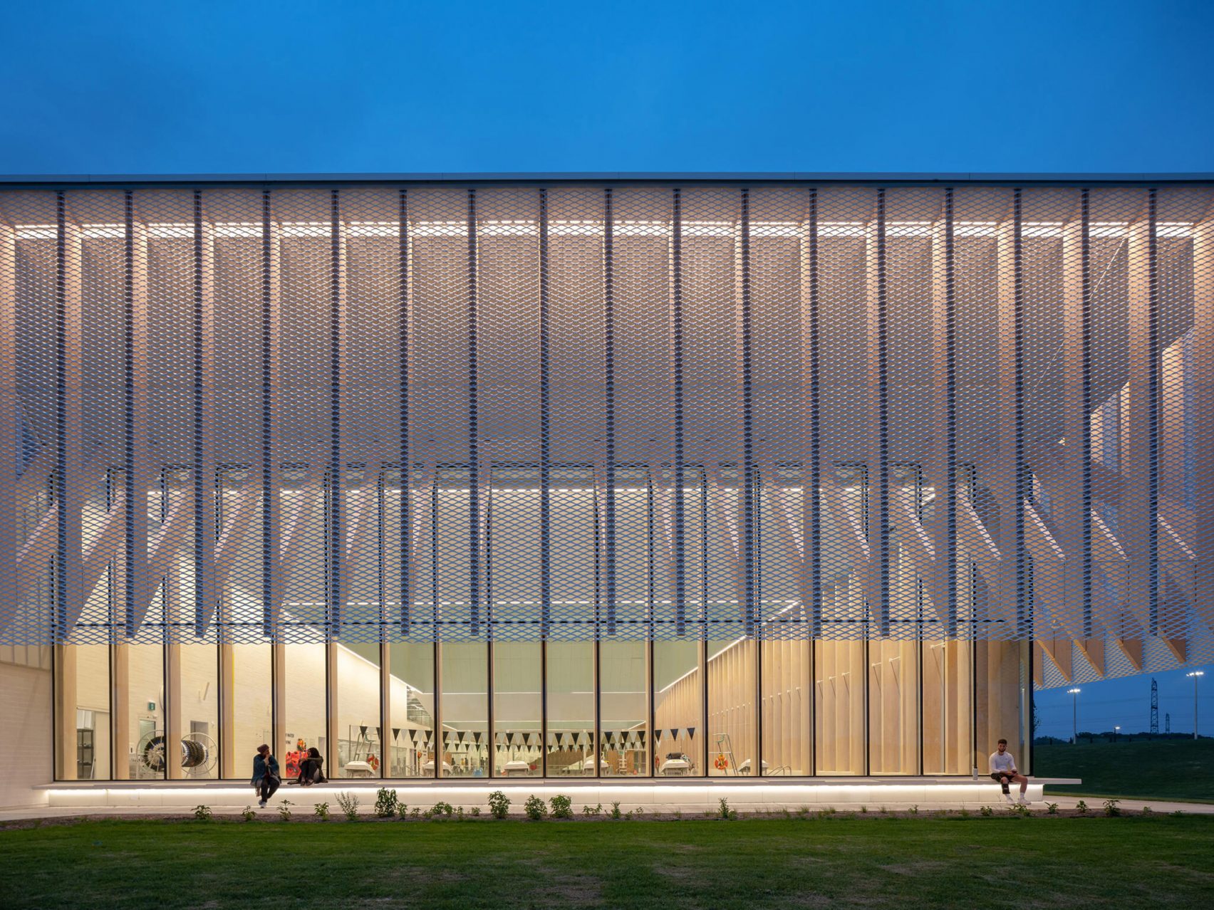 MJMA Architecture & Design marries wood and mesh for sports centre