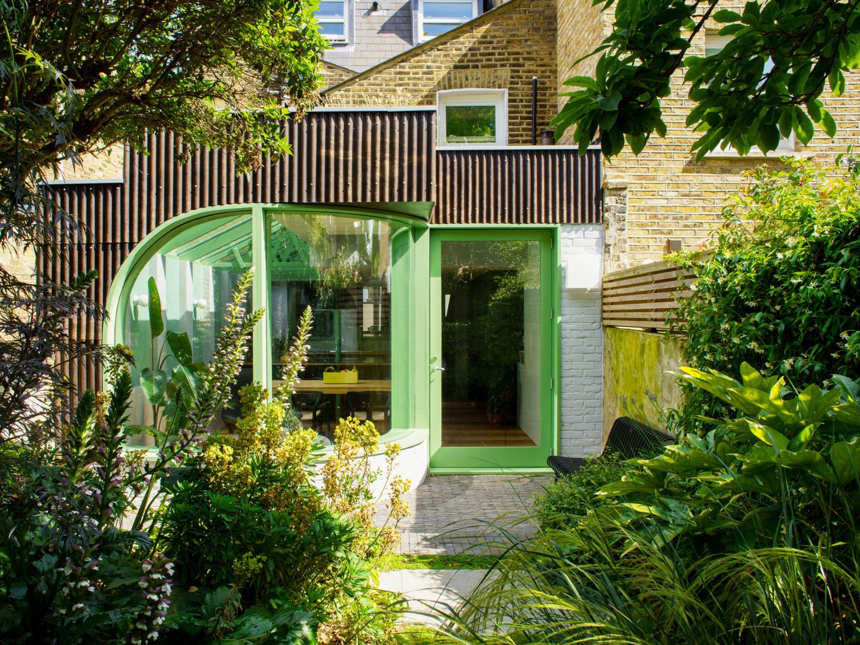 Can Relinks Verdant House With Garden Using Statement Green Window