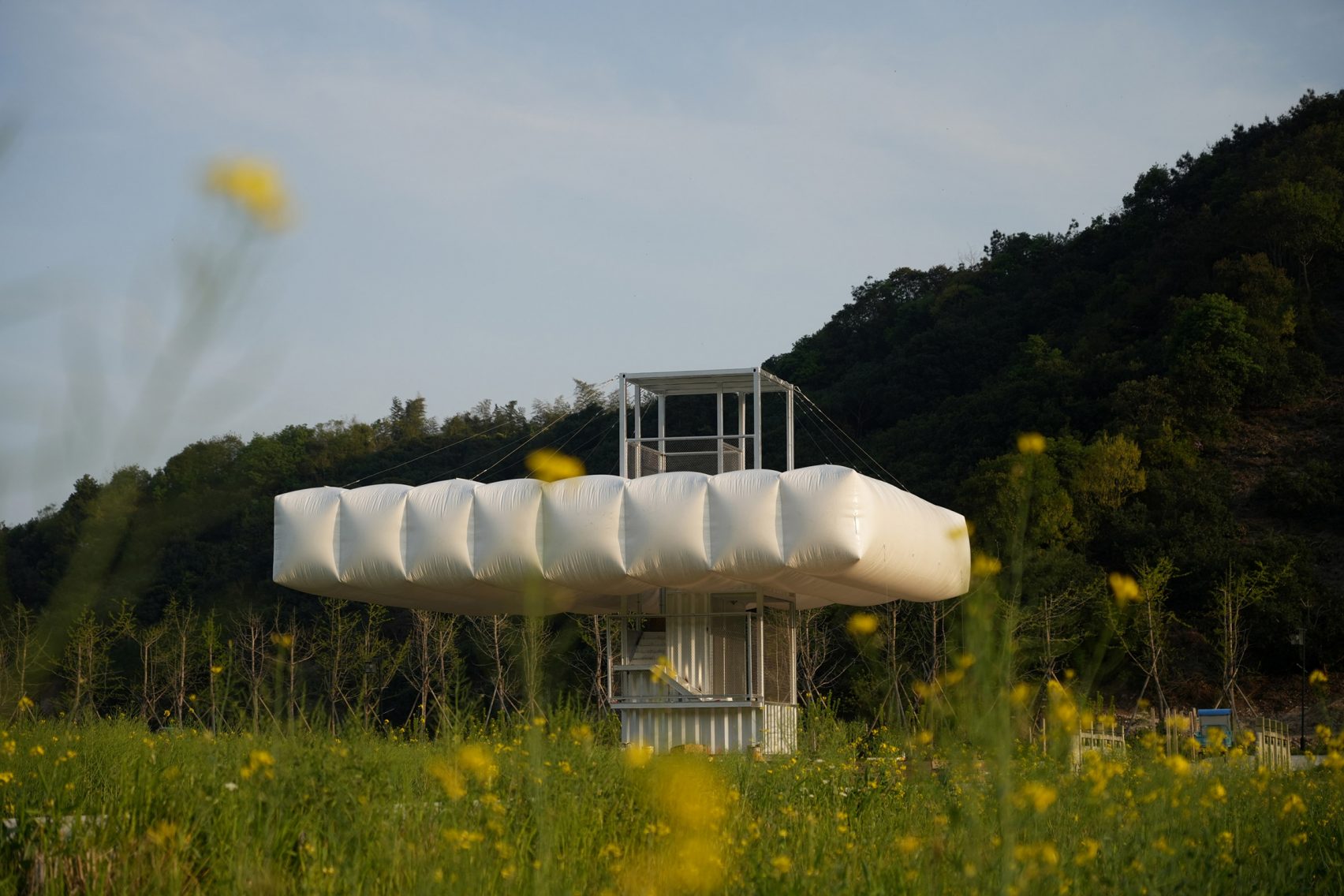 Shipping containers and inflatables form Down in the Clouds pavilions