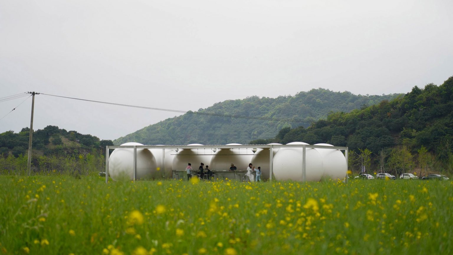 Shipping containers and inflatables form Down in the Clouds pavilions