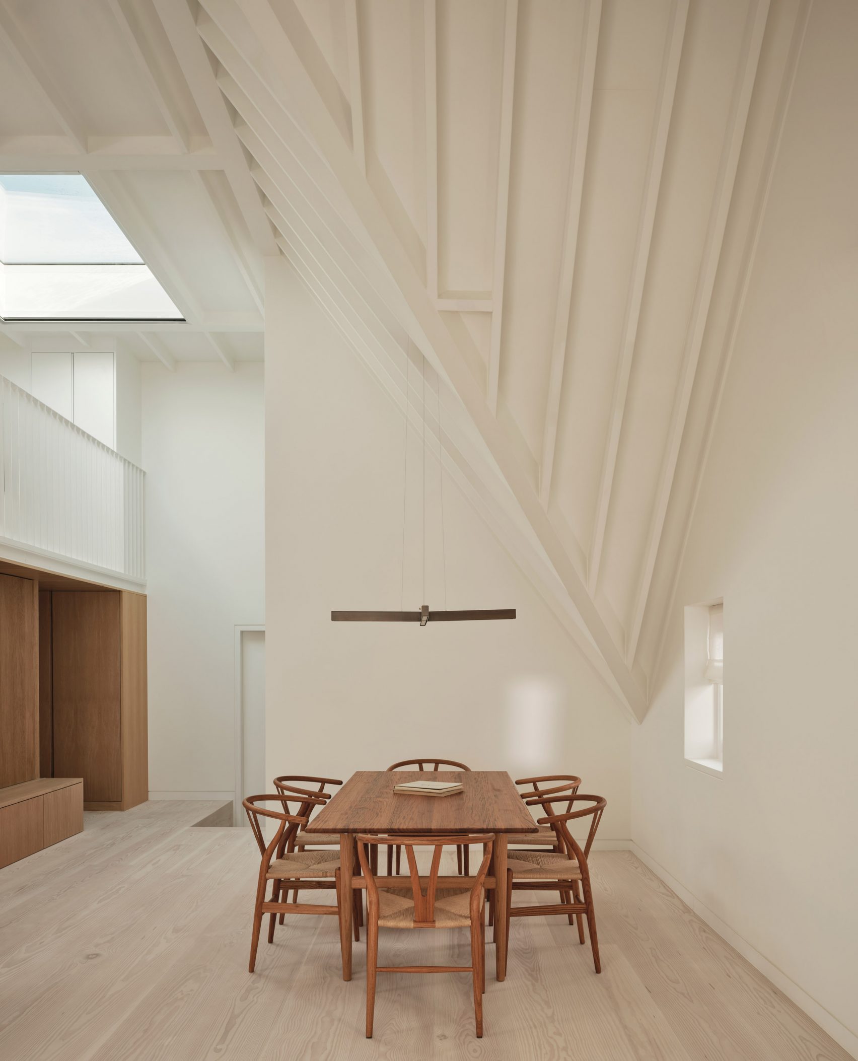 Mata Architects expands Vaulting Loft flat with "cathedral-like" roof