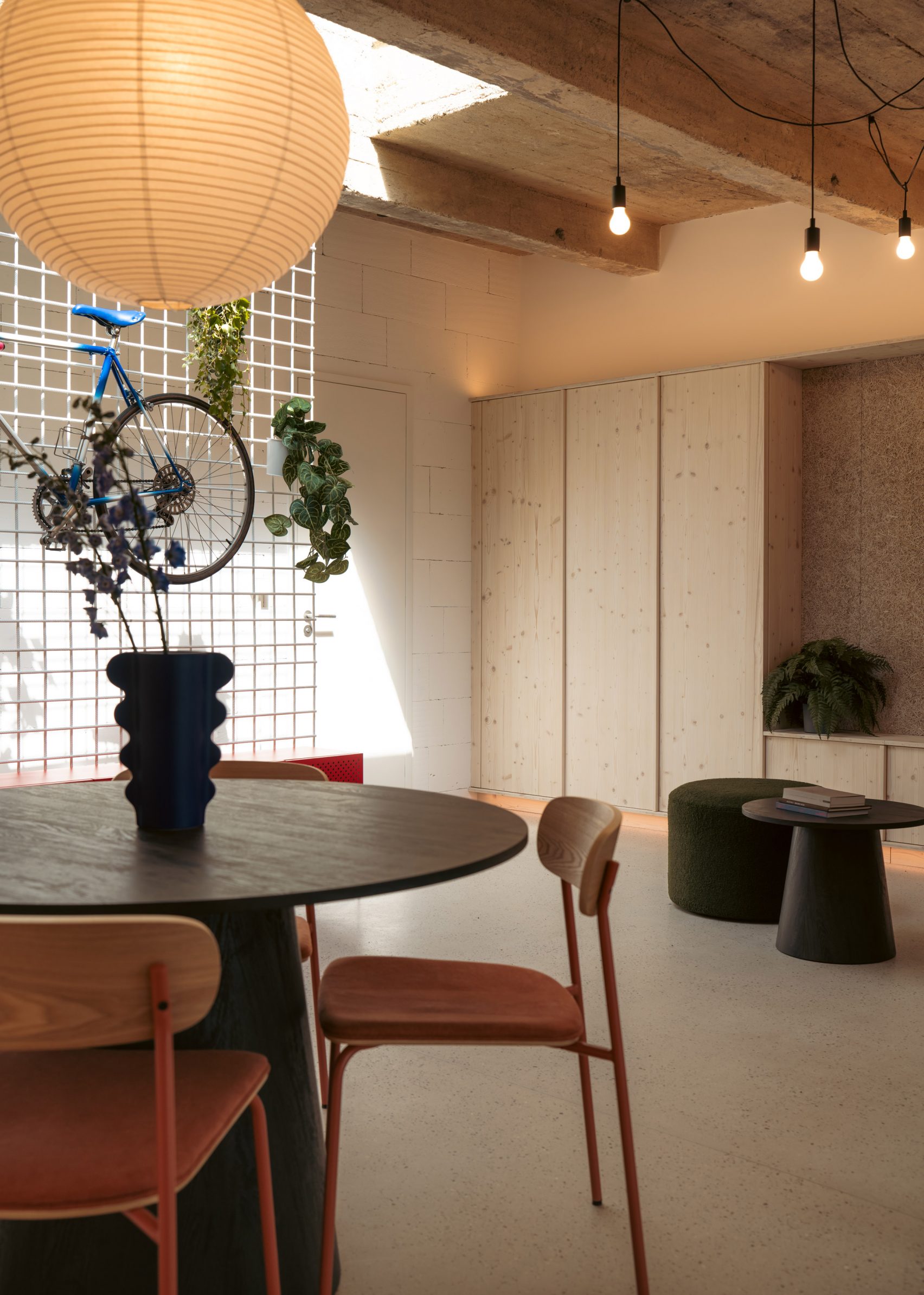 BekArch converts disused workshop into skylight-topped apartment