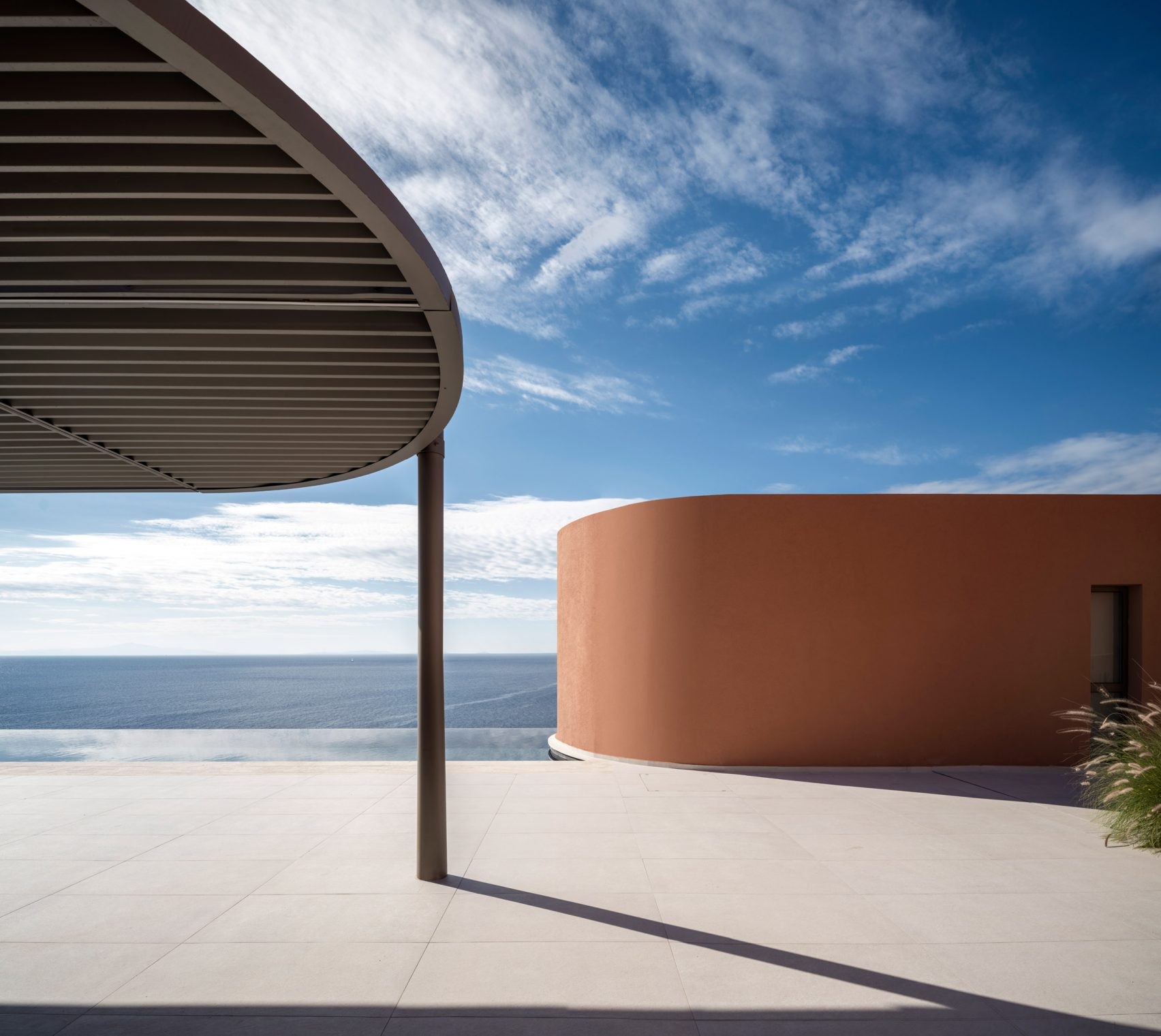 Ateno Architecture Studio sinks Olen resort into Greek cliff edge