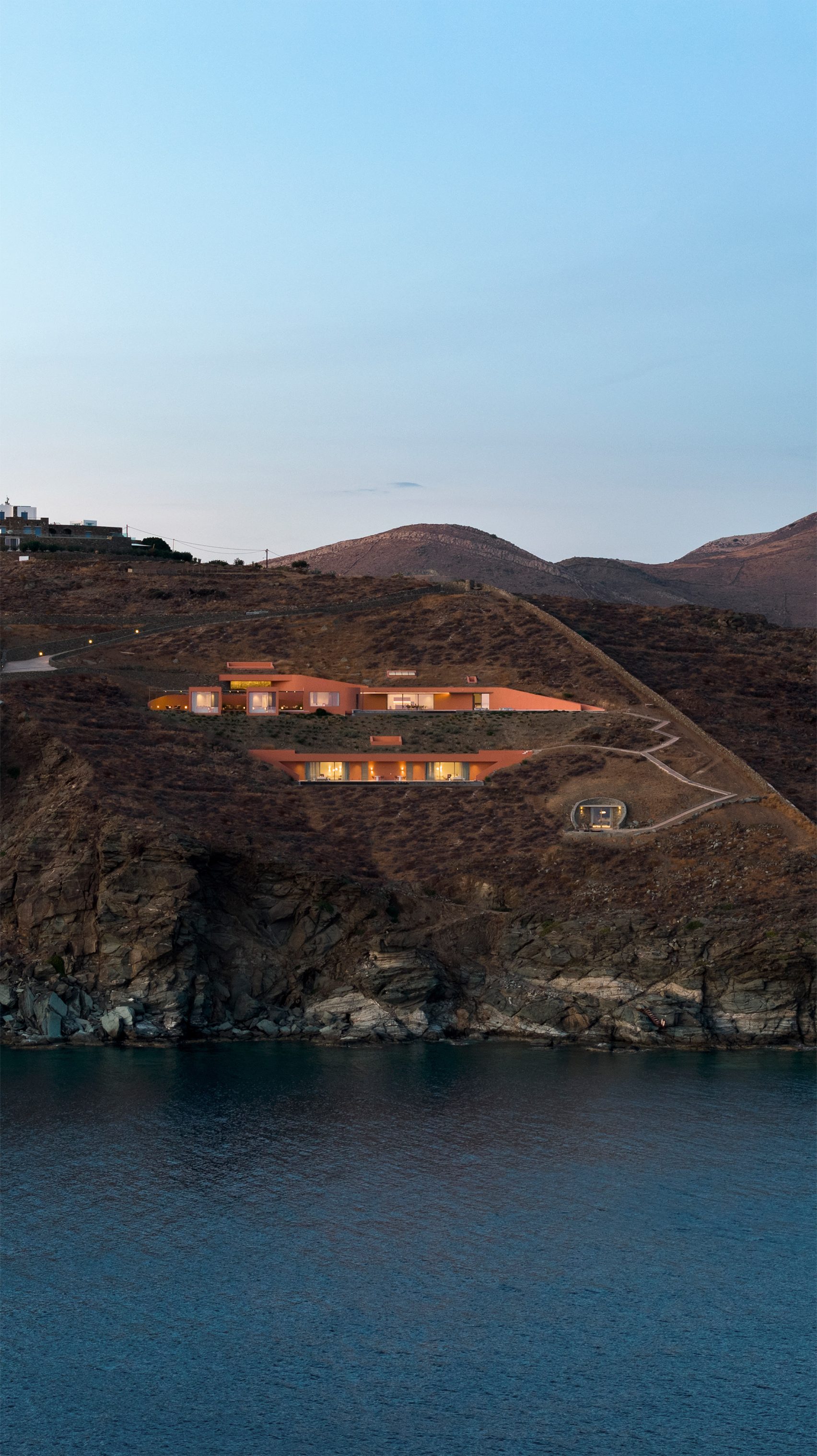 Ateno Architecture Studio sinks Olen resort into Greek cliff edge
