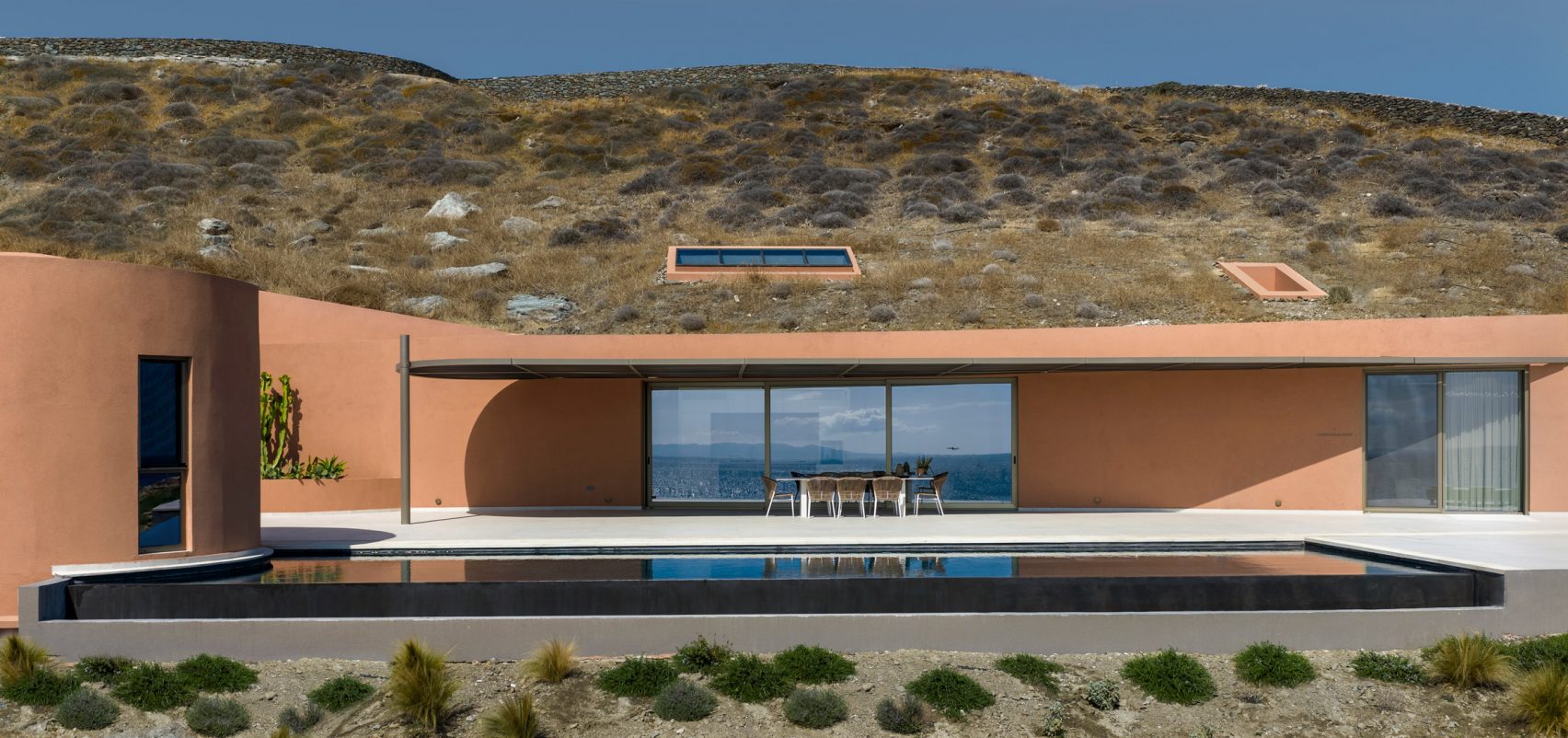 Ateno Architecture Studio sinks Olen resort into Greek cliff edge