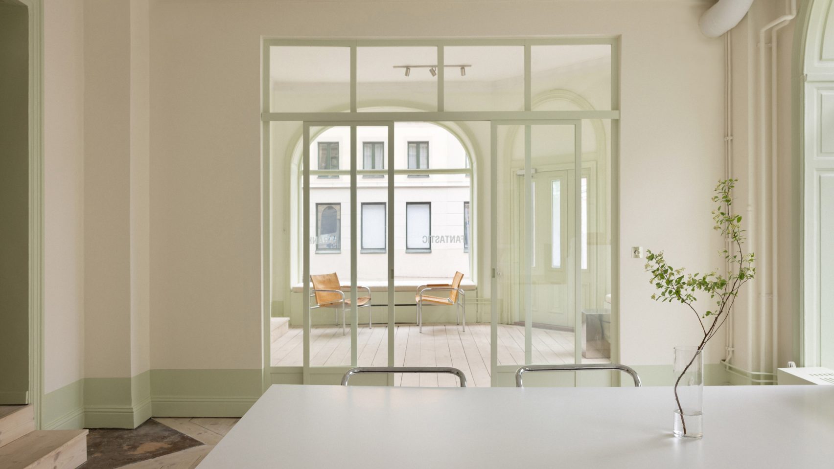 ASKA unifies rooms of Fantastic Frank office with green accents