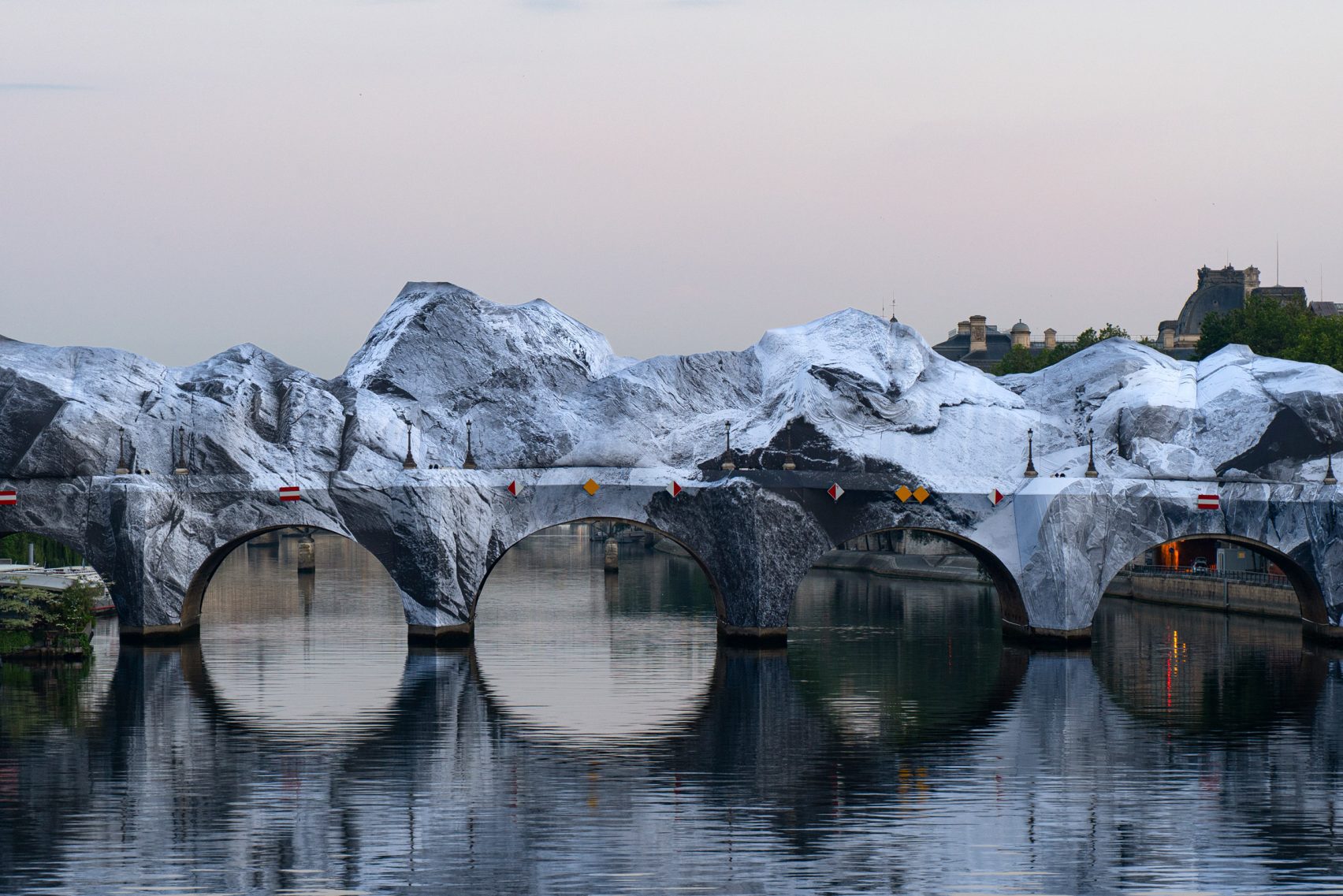 JR engulfs Paris's oldest bridge with giant cavernous inflatable