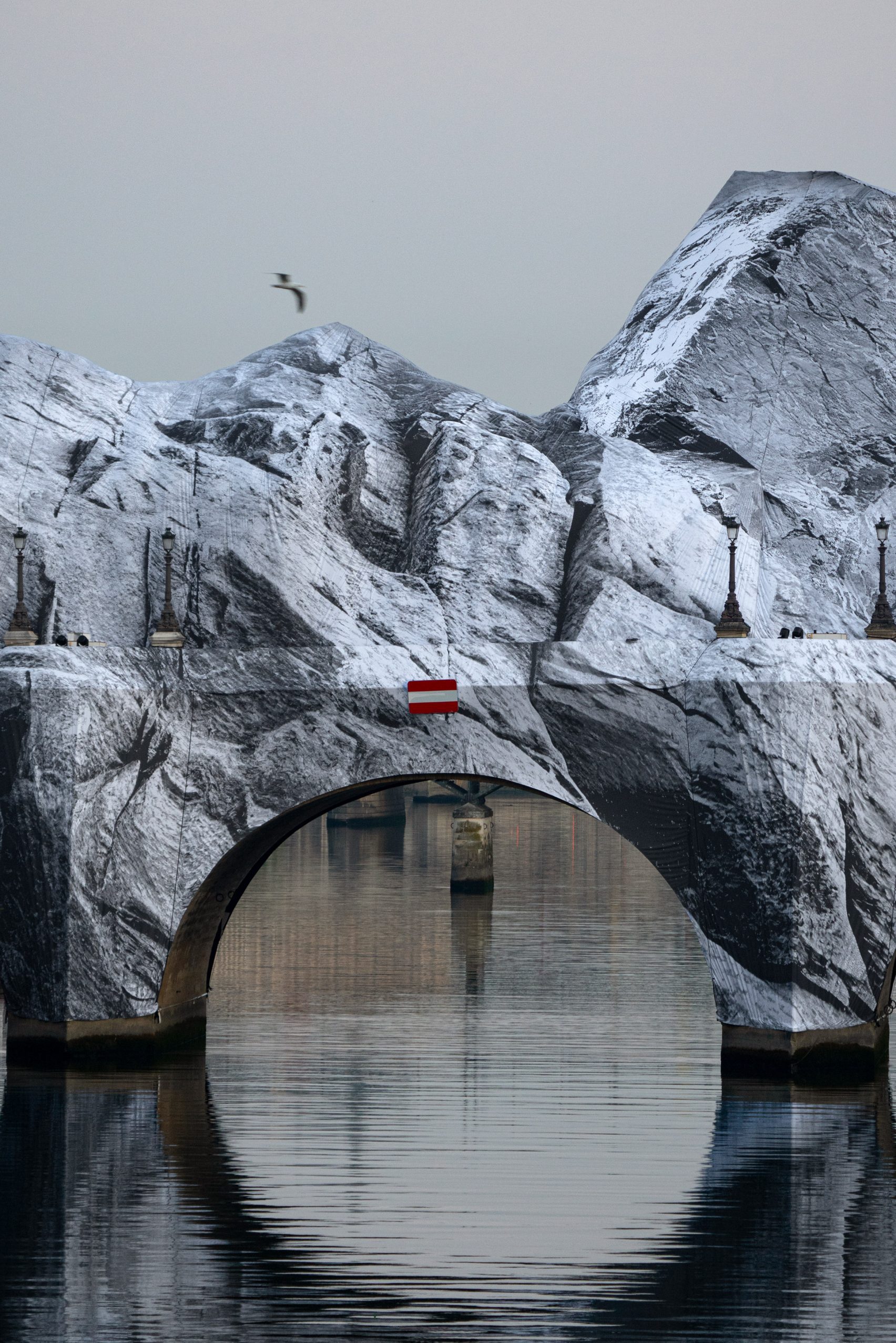 JR engulfs Paris's oldest bridge with giant cavernous inflatable