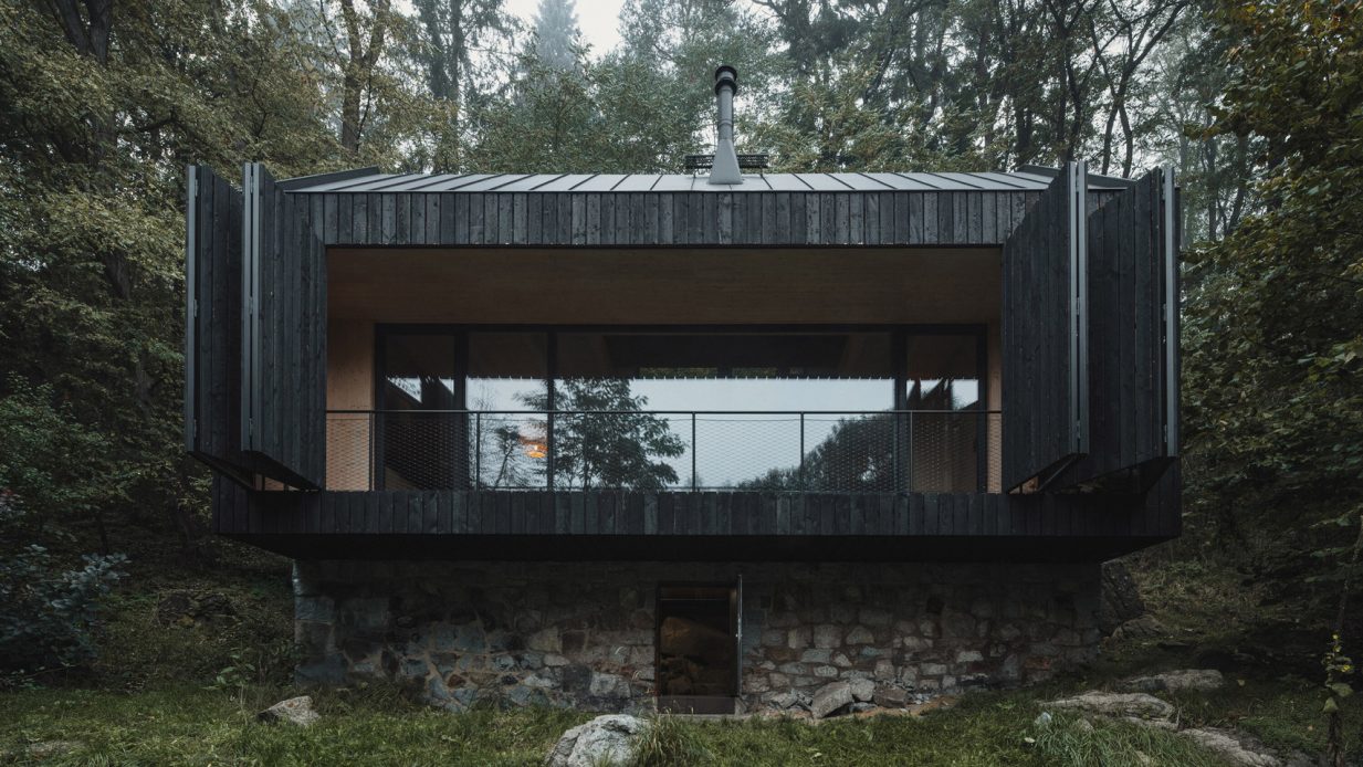 Mimosa Architects shapes Czech cabin from "rock, river and fire"