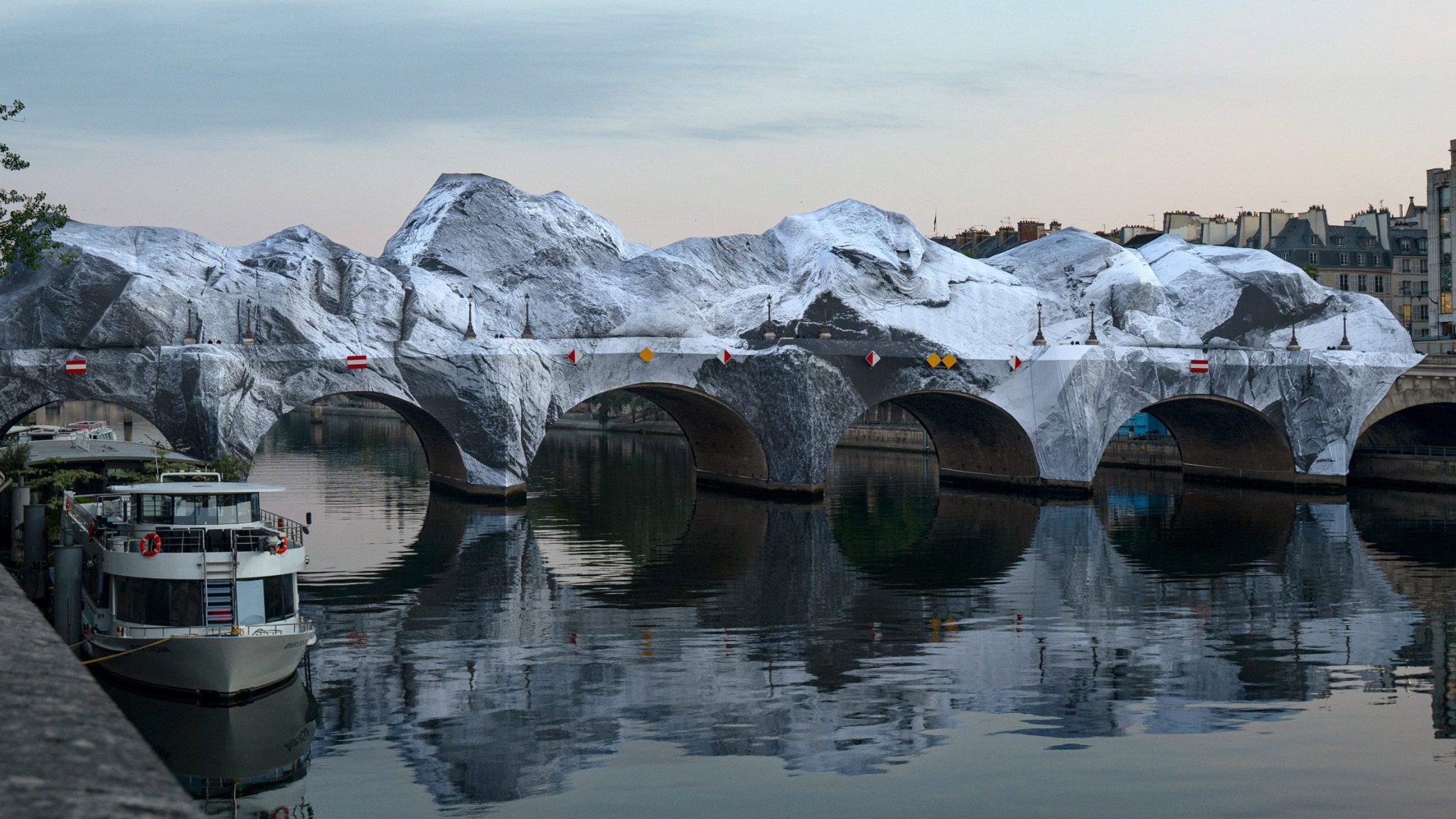 Wind damage delays opening of La Caverne du Pont Neuf by JR